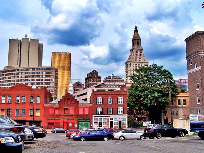 Hartford's skyline rises like a colorful layer cake of architectural styles, from tiny red buildings to soaring towers above.