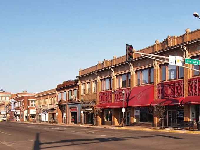 Historic buildings line Hibbing's streets with character, where Bob Dylan's hometown offers Iron Range affordability and genuine community.