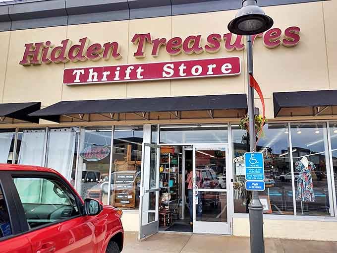 Hidden Treasures lives up to its name with a bright, inviting storefront. The red sign practically shouts "bargains inside!"