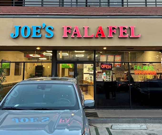Clean lines and bright lettering mark this falafel spot where crispy chickpea perfection awaits the curious and hungry.