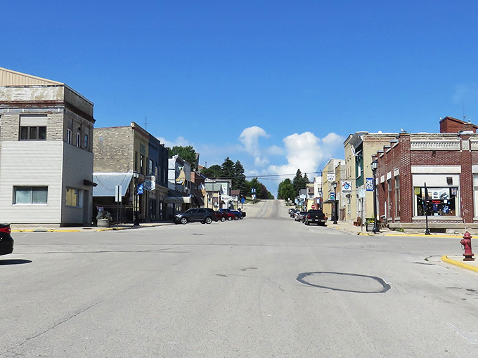 Kewaunee’s Main Street feels wonderfully unhurried, brick storefronts and blue skies inviting you to slow down and stay awhile.