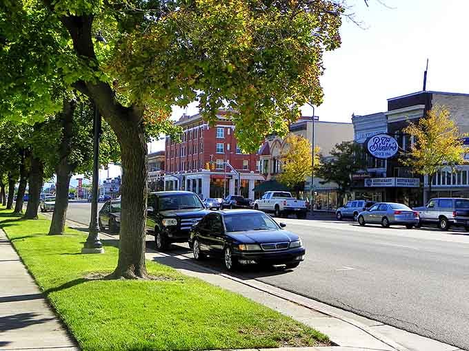 Logan's historic downtown showcases beautiful brick buildings beneath a canopy of trees that frame the mountain views.