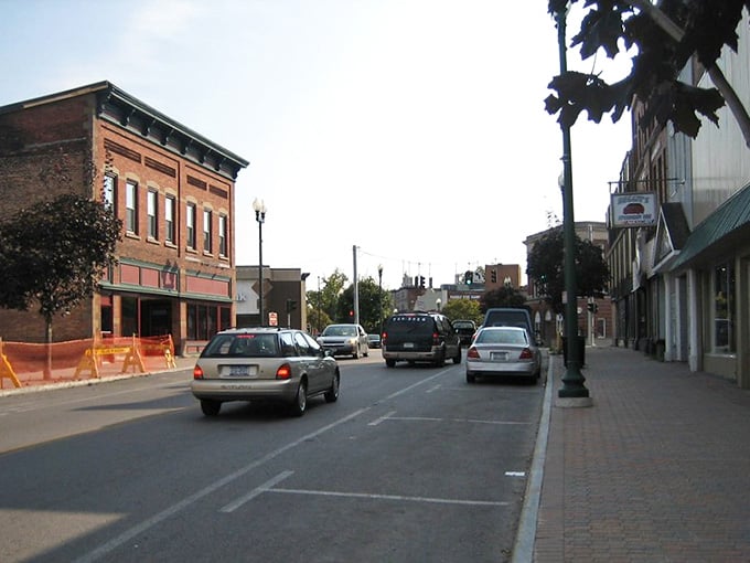Grand Victorian mansion with wraparound porch stands as testament to a town that honors history while welcoming new neighbors.