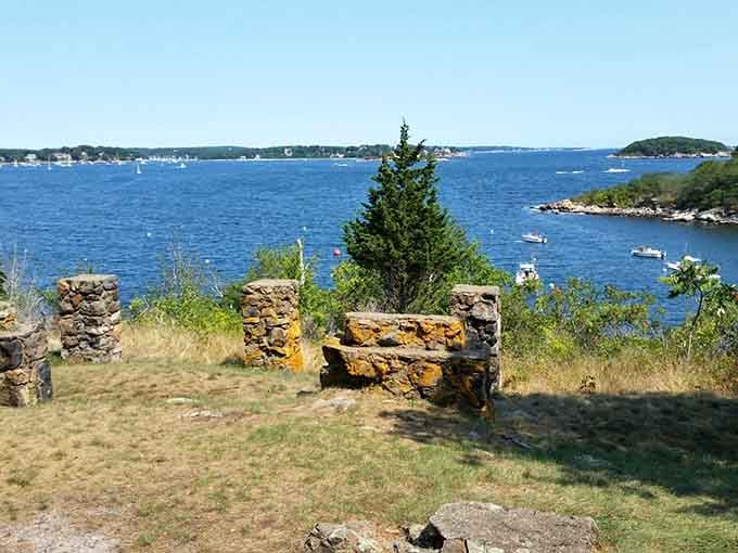 Crumbling stone foundations whisper stories of island life, when these rocks sheltered families through countless New England winters.