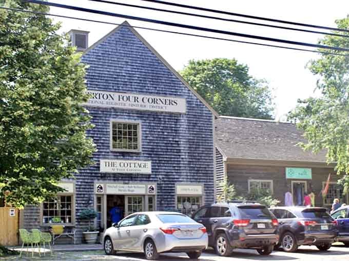 The charming Tiverton Four Corners building houses local shops and businesses, representing the heart of this quaint rural village community.
