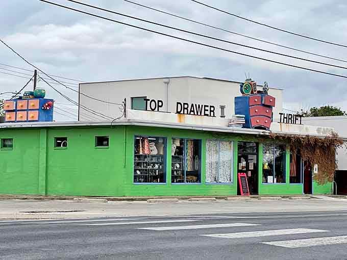 Those quirky rooftop decorations hint at the creative, curated collection waiting inside this bright green building.