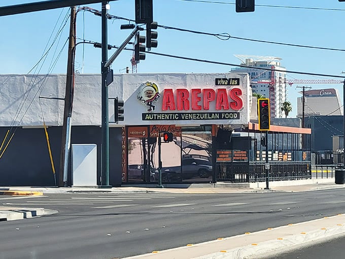 Viva Las Arepas' bright sign stands out against the Vegas sky, promising Venezuelan delights in the desert.