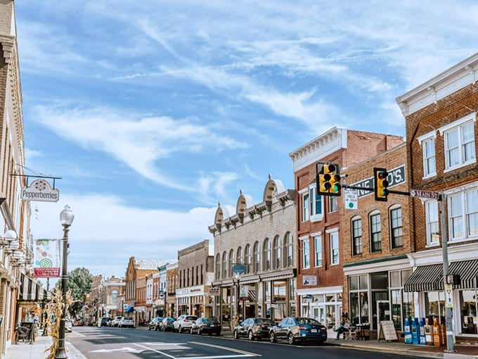 Red shutters and gas-style lamps add character to streets where neighbors still gather and community connections run deep.