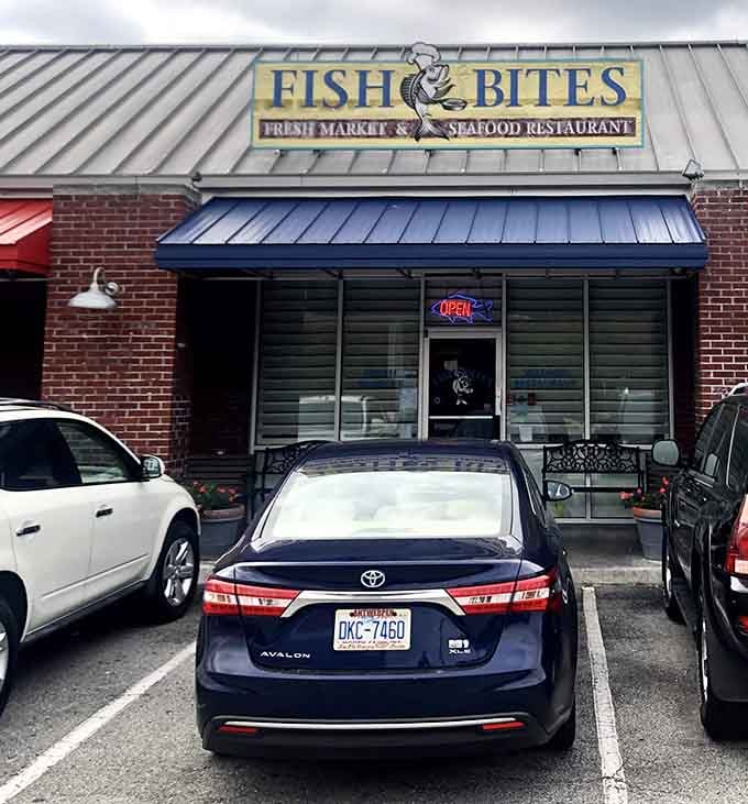 That clean brick facade and metal roof combination creates an inviting entrance to your next favorite seafood spot.