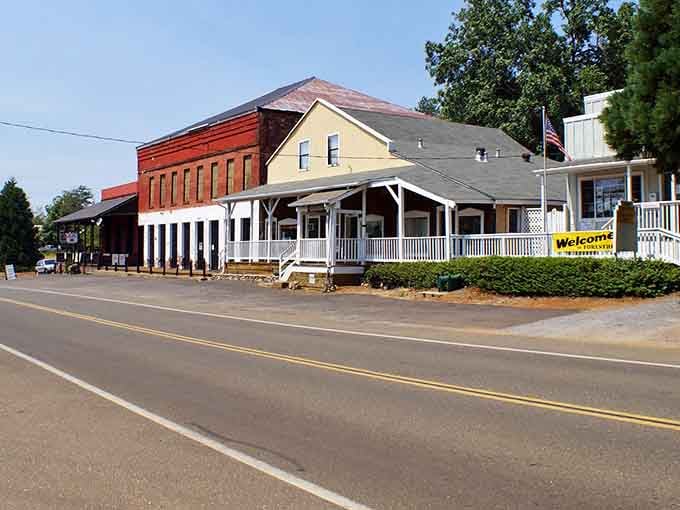 Wide porches and historic facades line the main drag where pickup trucks outnumber sedans and everyone waves hello.
