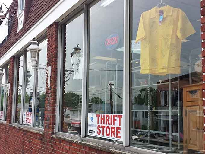 That cheerful yellow blazer in the window catches afternoon light like a beacon, calling to anyone tired of boring mall fashion.