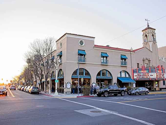Evening light bathes the street in golden warmth, making even a simple drive feel like discovering something special.