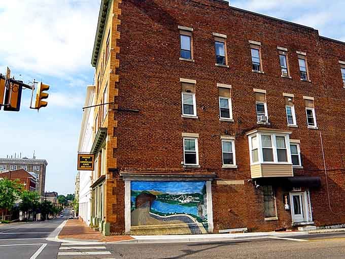 Vintage brick with a painted mural adds artistic flair to everyday streets where creativity thrives without requiring trust funds.