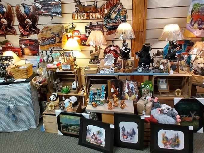 Warm lighting illuminates collectibles and handmade treasures displayed with care in this cozy corner booth.