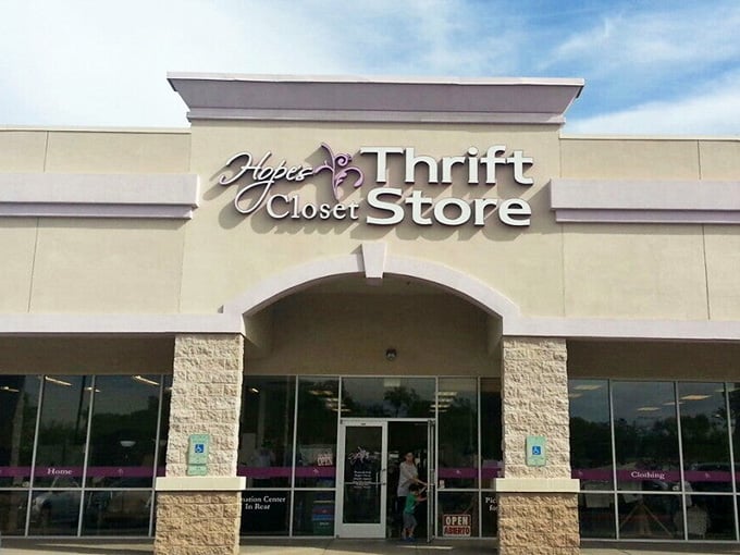 The two-story building and prominent signage make this thrift boutique impossible to miss from the busy street outside.