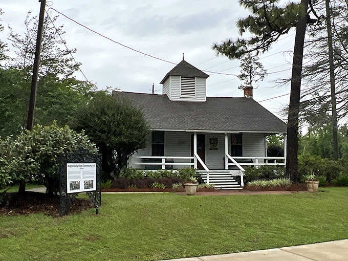 The historic schoolhouse in Magnolia Springs preserves the town's heritage, a reminder of simpler times in this riverside community.