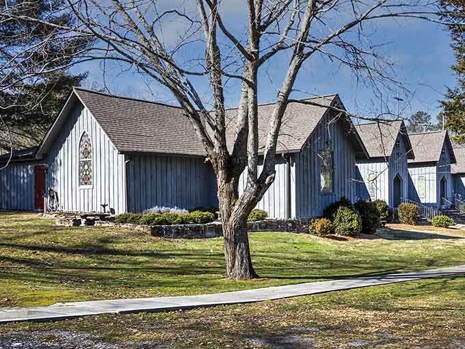 Clean lines and vertical siding create a distinctive architectural style nestled among towering trees and green lawns.