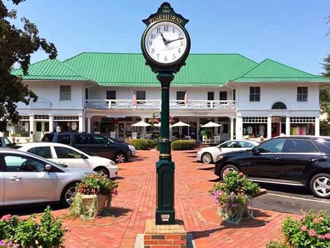 That classic town clock anchors a brick plaza where time slows down and neighbors still stop to chat.