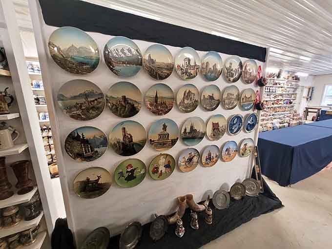 Painted plates depicting European landmarks create a stunning wall display that rivals any art gallery's finest collection.