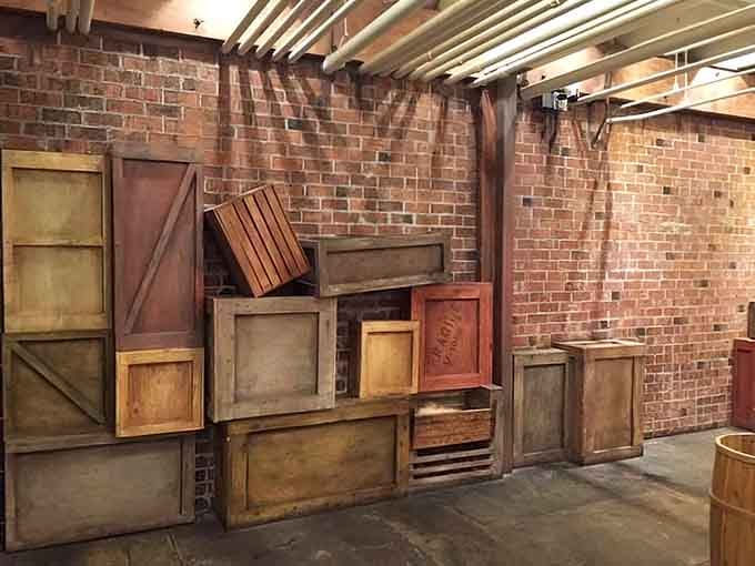 Exposed brick and weathered wood boxes whisper stories of Prohibition-era charm in this hidden dining treasure.