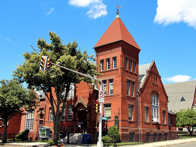 When architectural charm meets small-town character—this stately corner landmark commands attention with every weathered brick.