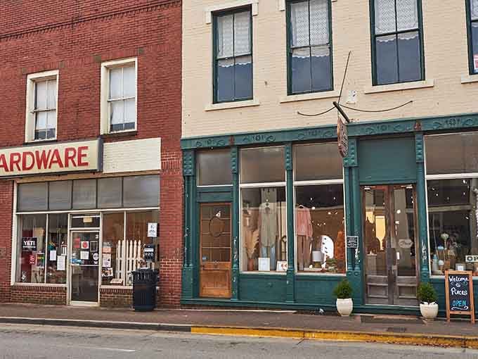 The old storefront strip shows its age gracefully with arched windows that have watched generations of shoppers come and go.