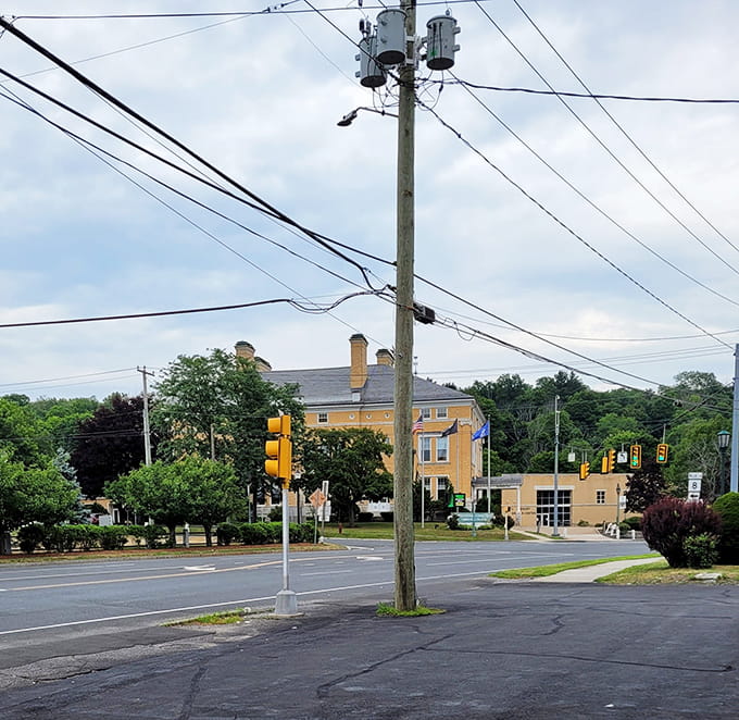 The quiet streets and historic architecture whisper stories of mill workers and Main Street merchants from another era.