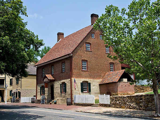 Colonial brick and mortar stands firm like America's foundation built to last centuries.