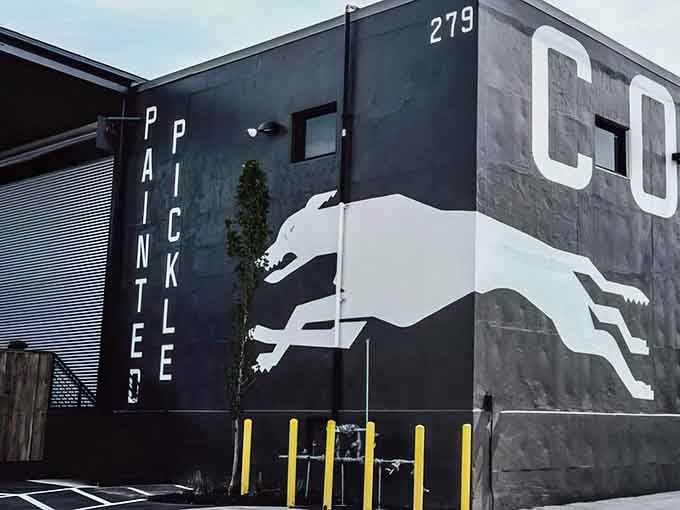 That leaping dog mural announces you've arrived somewhere special, where sports meet serious good times.