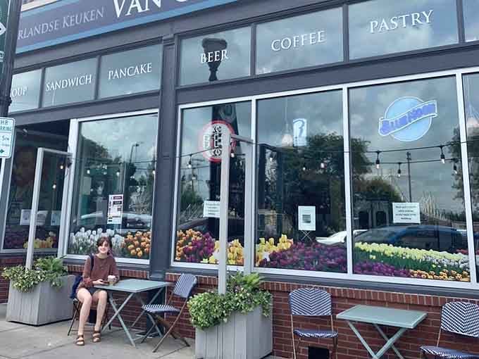 That storefront isn't just inviting, it's practically giving you a hug from across the street with those cheerful flowers.