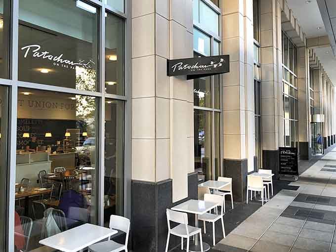That storefront glow means serious breakfast business is happening inside, and your stomach knows it.