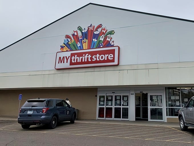 That cheerful burst of colorful pencils above the sign perfectly captures the creative possibilities waiting inside this treasure trove.