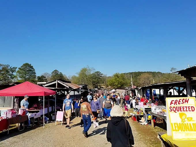 Crowds gather under blue skies hunting bargains that make retail prices look downright silly by comparison.