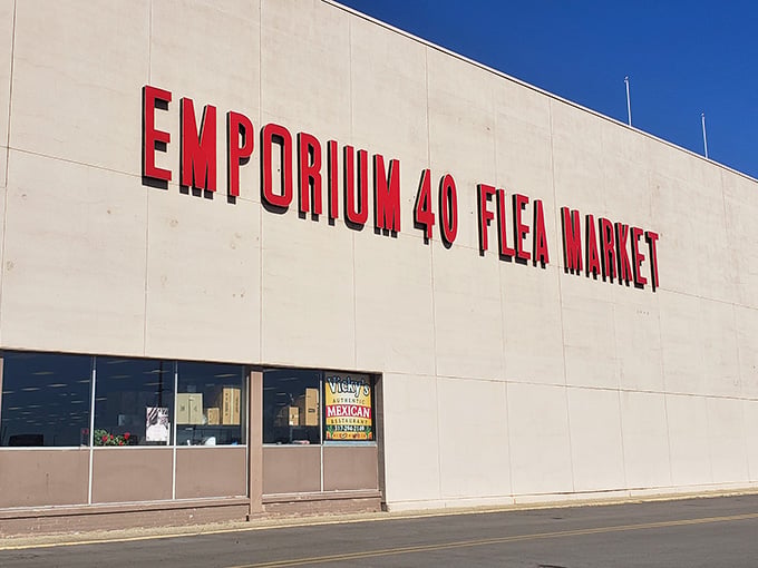That bold red lettering against the cream facade isn't just signage, it's a beacon calling bargain hunters home.