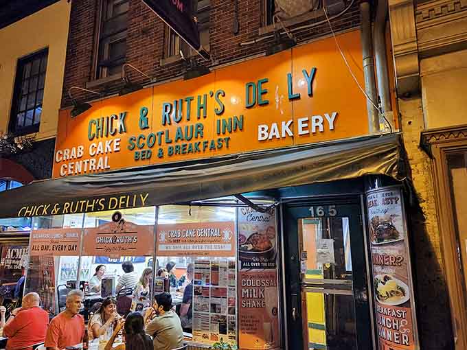 That glowing sign isn't just advertising; it's a beacon calling hungry souls to breakfast paradise and patriotic traditions.
