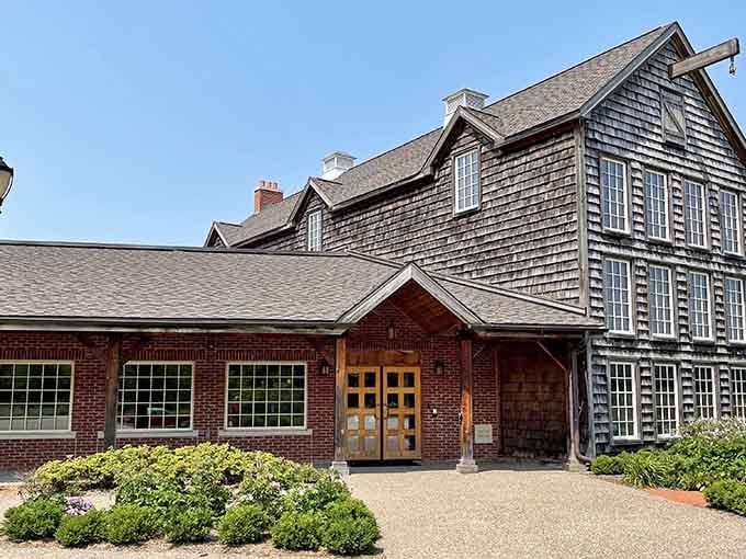 Summer blooms frame the entrance where masterpieces await inside, making culture accessible without the coastal attitude.