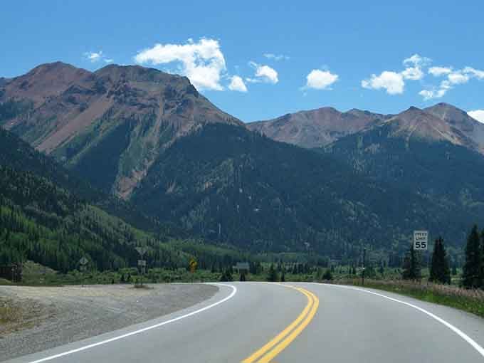 The open road beckons with promises of adventure, mountain air, and maybe a few white-knuckle moments ahead.