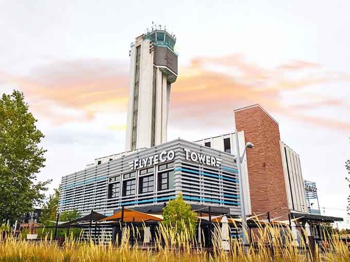 That iconic tower isn't just for show; it's your dinner destination with serious Denver history baked in.
