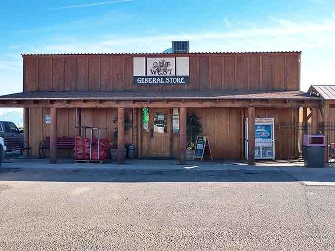 The rustic signage against that brilliant blue sky practically begs you to pull over and discover what treasures await inside.