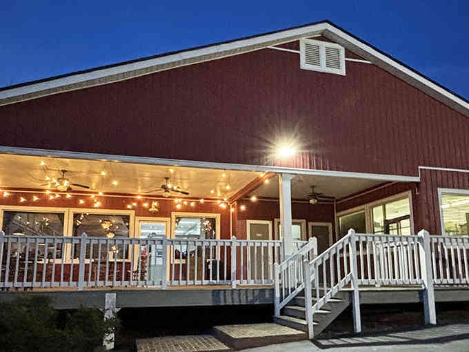 That red barn exterior lit up at twilight looks like the kind of place where magic happens on a plate.