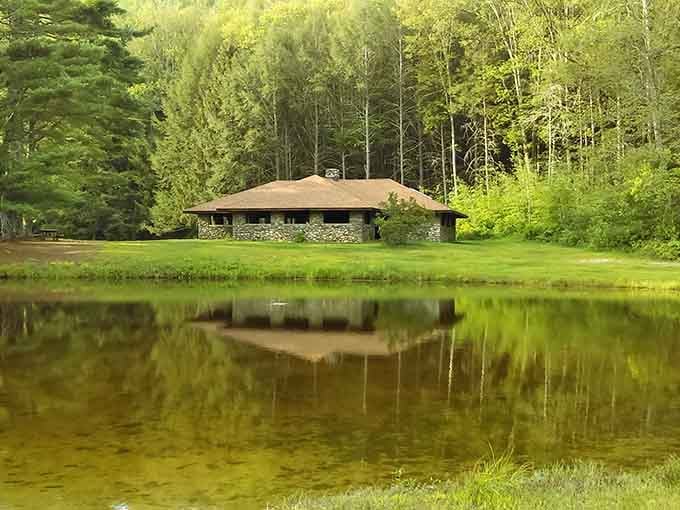 That stone pavilion reflected in still water looks like nature's own postcard come to life.