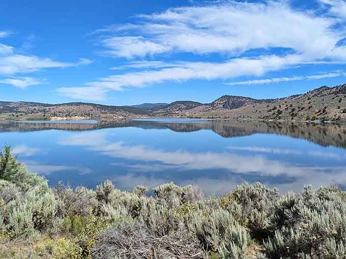 That mirror-perfect reflection isn't Photoshop trickery, it's just Unity Lake showing off on a calm day.