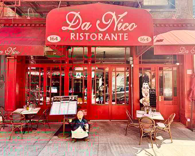 That bright red facade isn't just eye-catching, it's practically giving you a warm Italian hug from across the street.