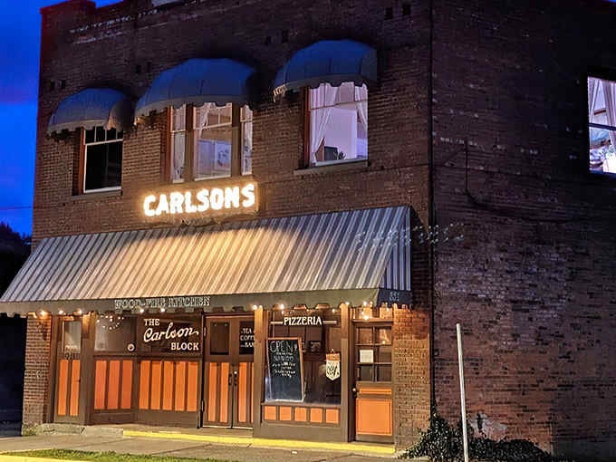 That historic brick facade glowing at twilight isn't just a building, it's a pizza pilgrimage destination. Photo credit: Jeff H.