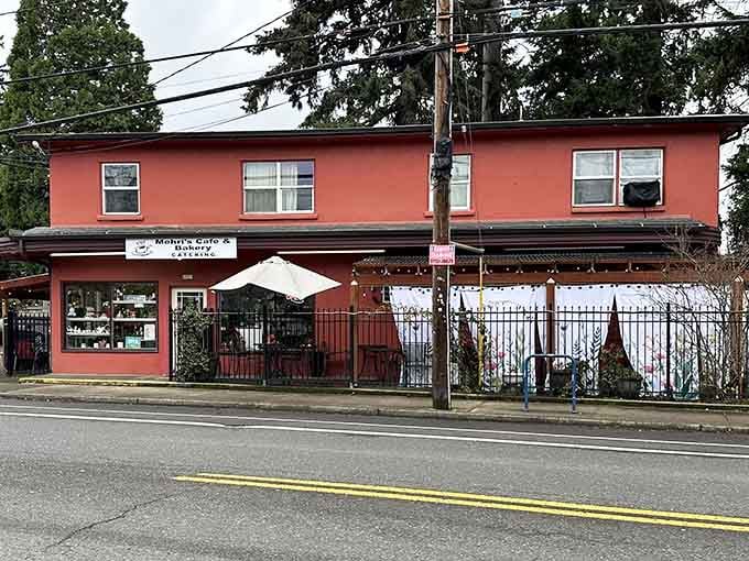 That coral-pink exterior isn't just a building, it's a beacon calling you home to breakfast paradise.