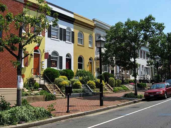 These colorful rowhouses look like someone organized a rainbow and gave it architectural ambitions worth photographing.