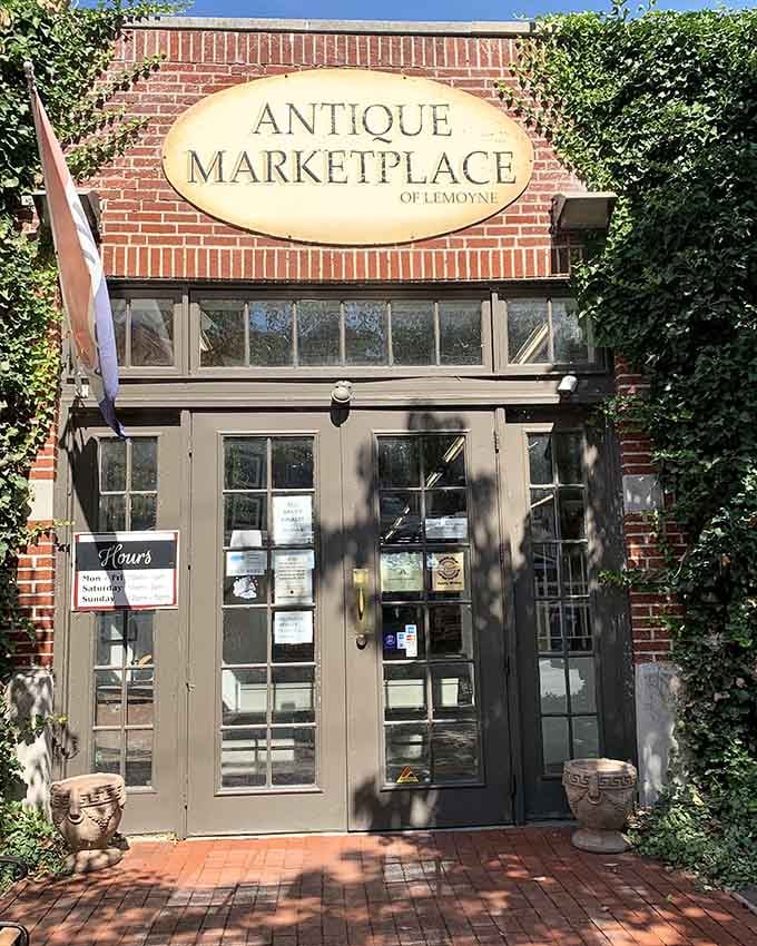 That brick facade and charming entrance are basically whispering "come find something you didn't know you needed until right now."