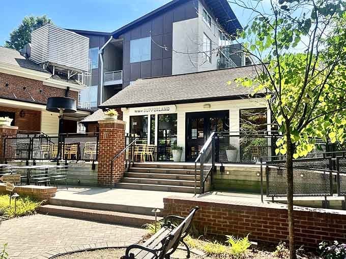 Modern meets rustic on this inviting patio where outdoor dining feels like a neighborhood secret worth sharing.