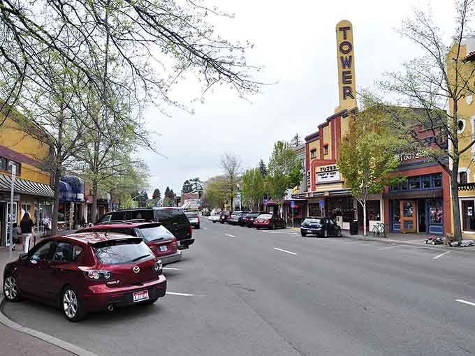 Downtown Bend's historic Tower Theatre marquee stands tall, reminding you that some places still value character over cookie-cutter charm.