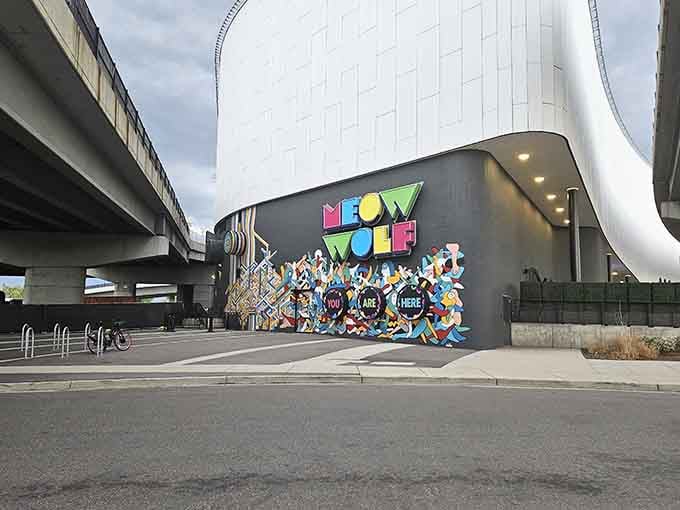 The vibrant exterior mural practically screams "You Are Here" in case your sense of reality needed confirmation.